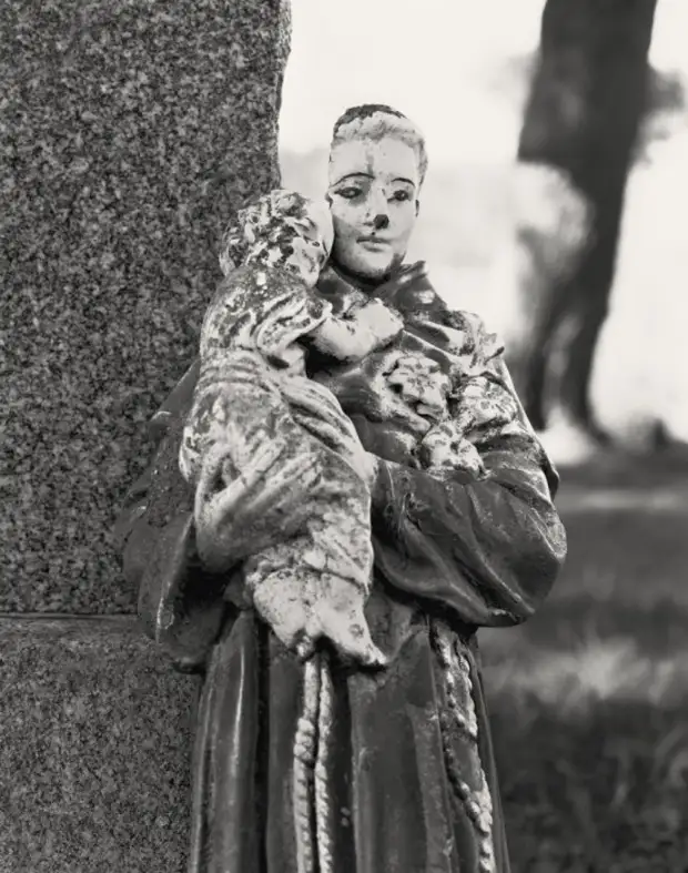 Une femme avec un enfant. L'artiste photo William Castellana.