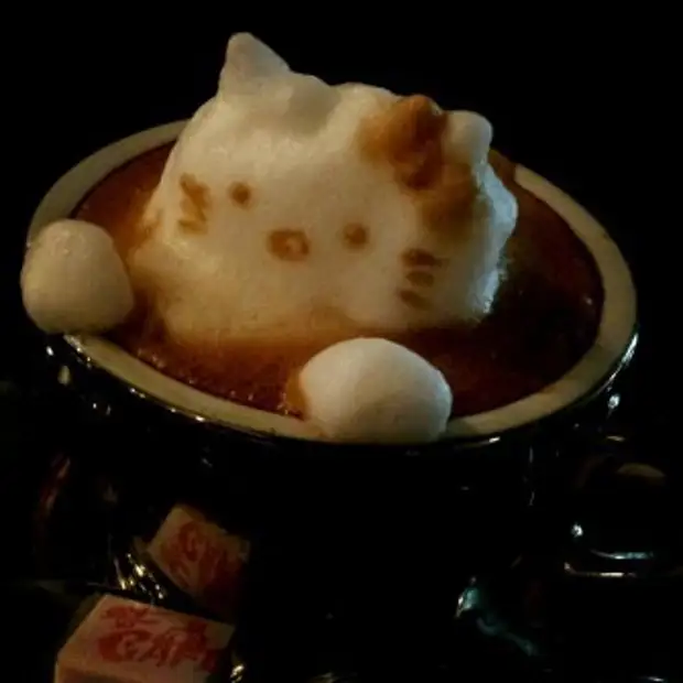 When cats are watching you from a cup of latte food, cats